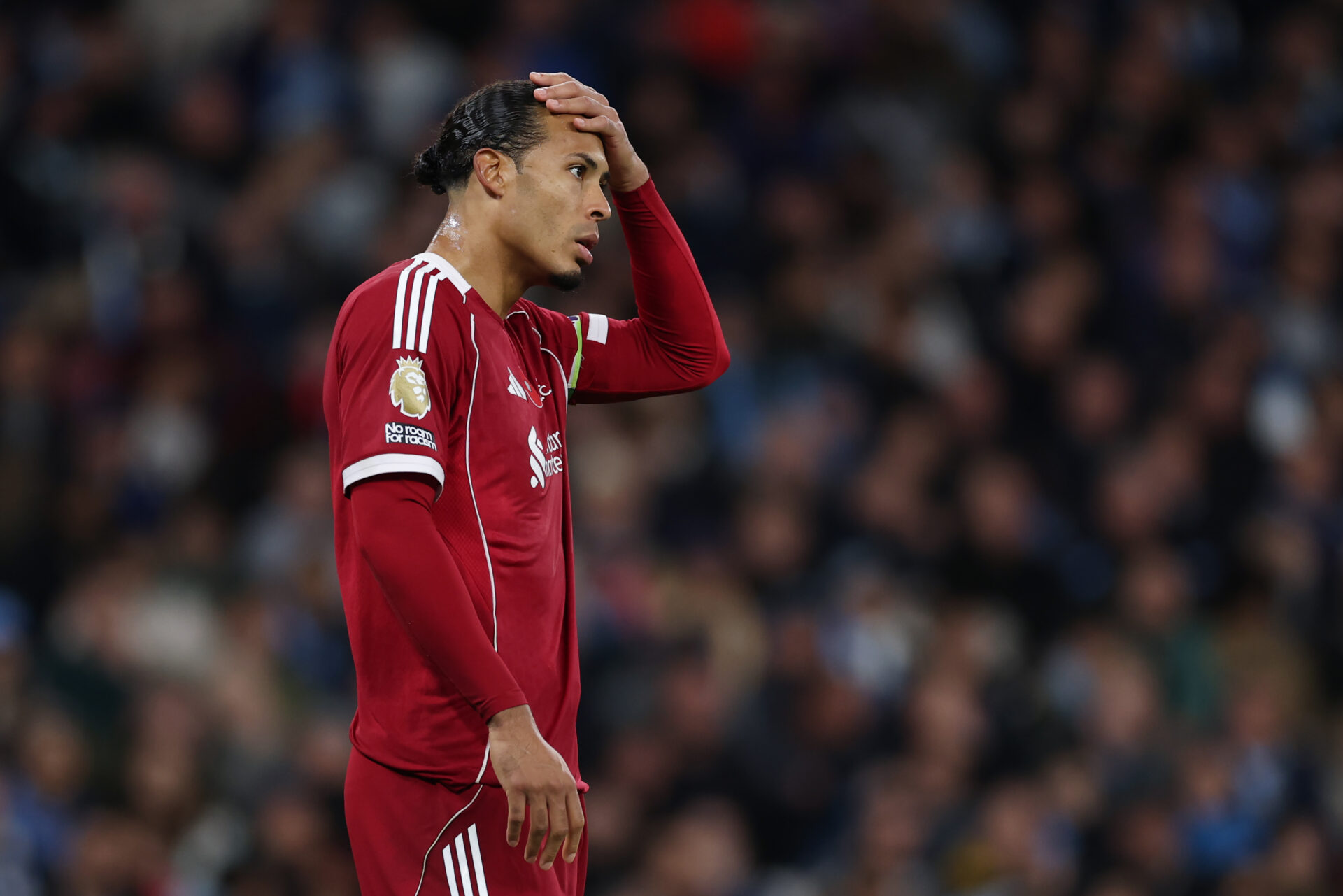 Arsenal record safe after Liverpool lose at Manchester City